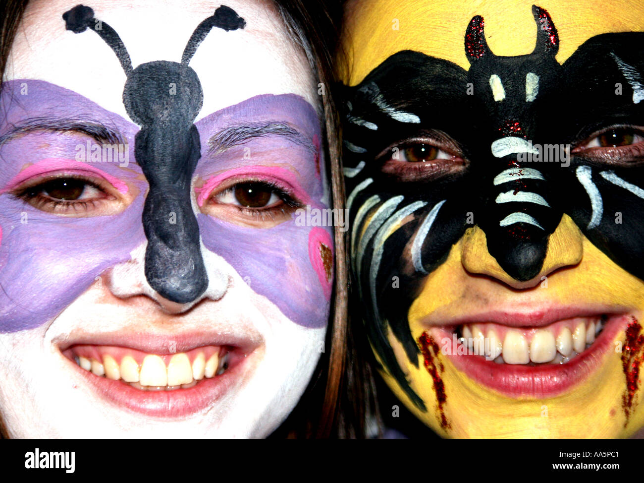 portrait two girls with face paints Stock Photo - Alamy