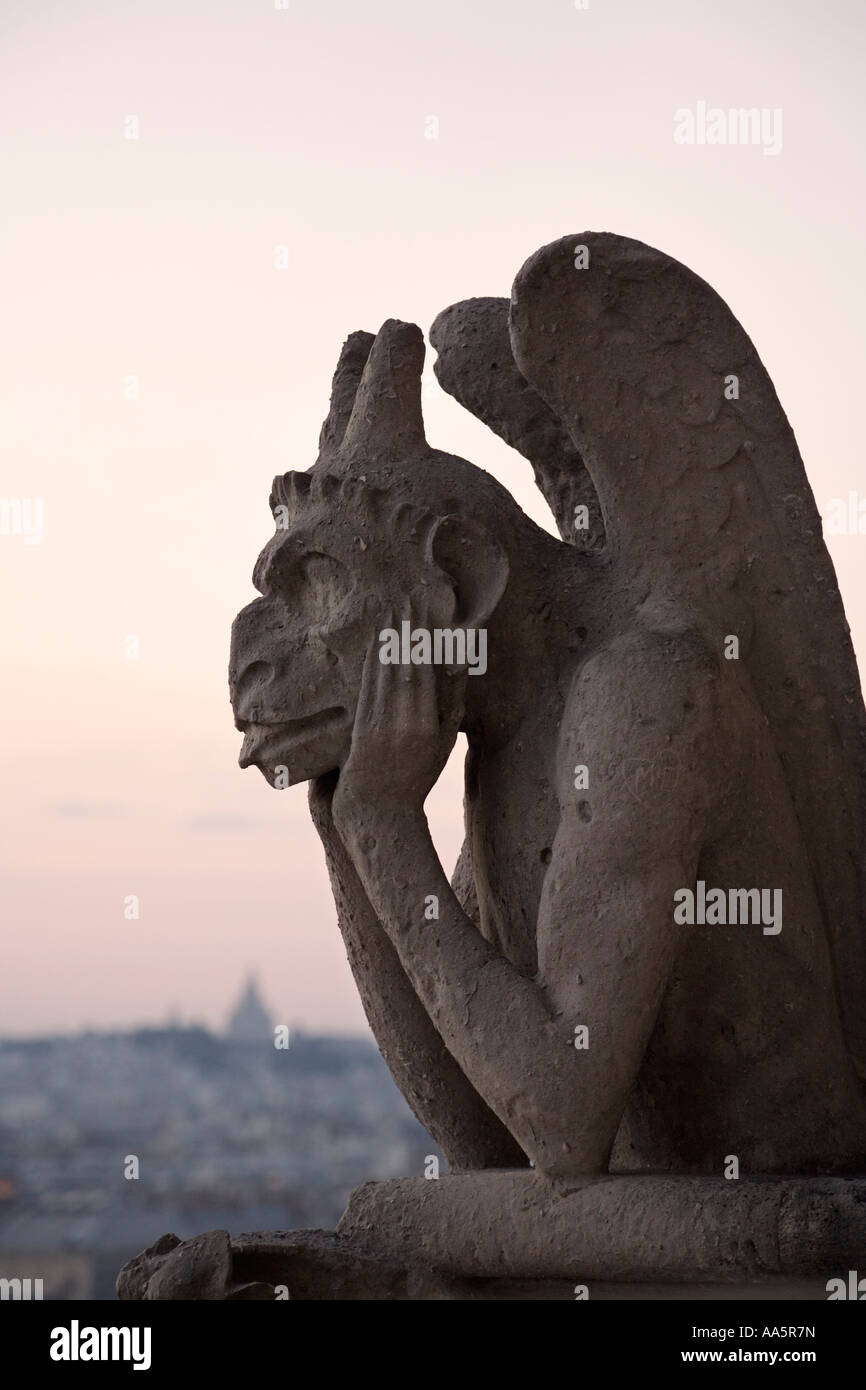 Paris, France. The Stryga gargoyle at Notre Dame Cathedral, sunset ...