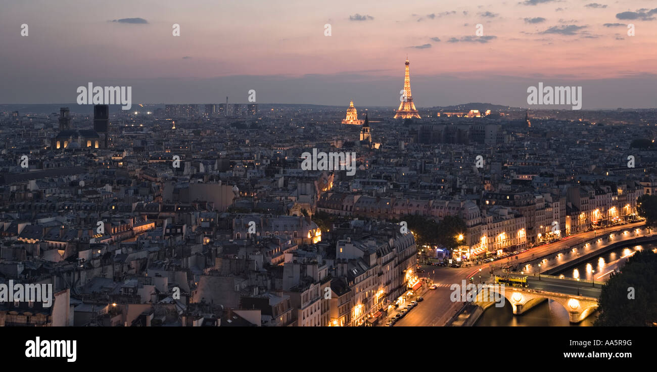 Paris, France. Skyline at dusk with Eiffel Tower in distance, sunset ...