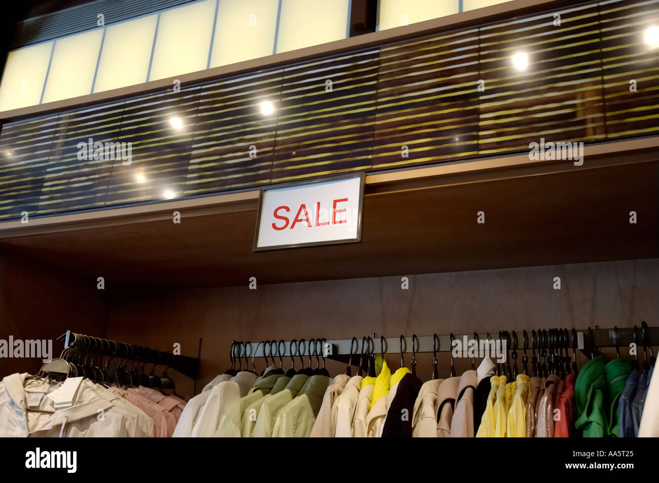 Clothes on SALE Sign posted Stock Photo - Alamy