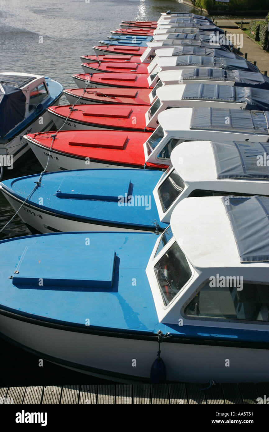 Line row of colourful boats moored at Wroxham village at the popular ...
