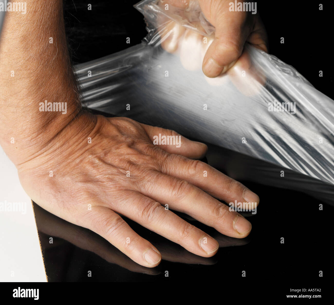 hand open transparent film take draw pull strength force Stock Photo ...