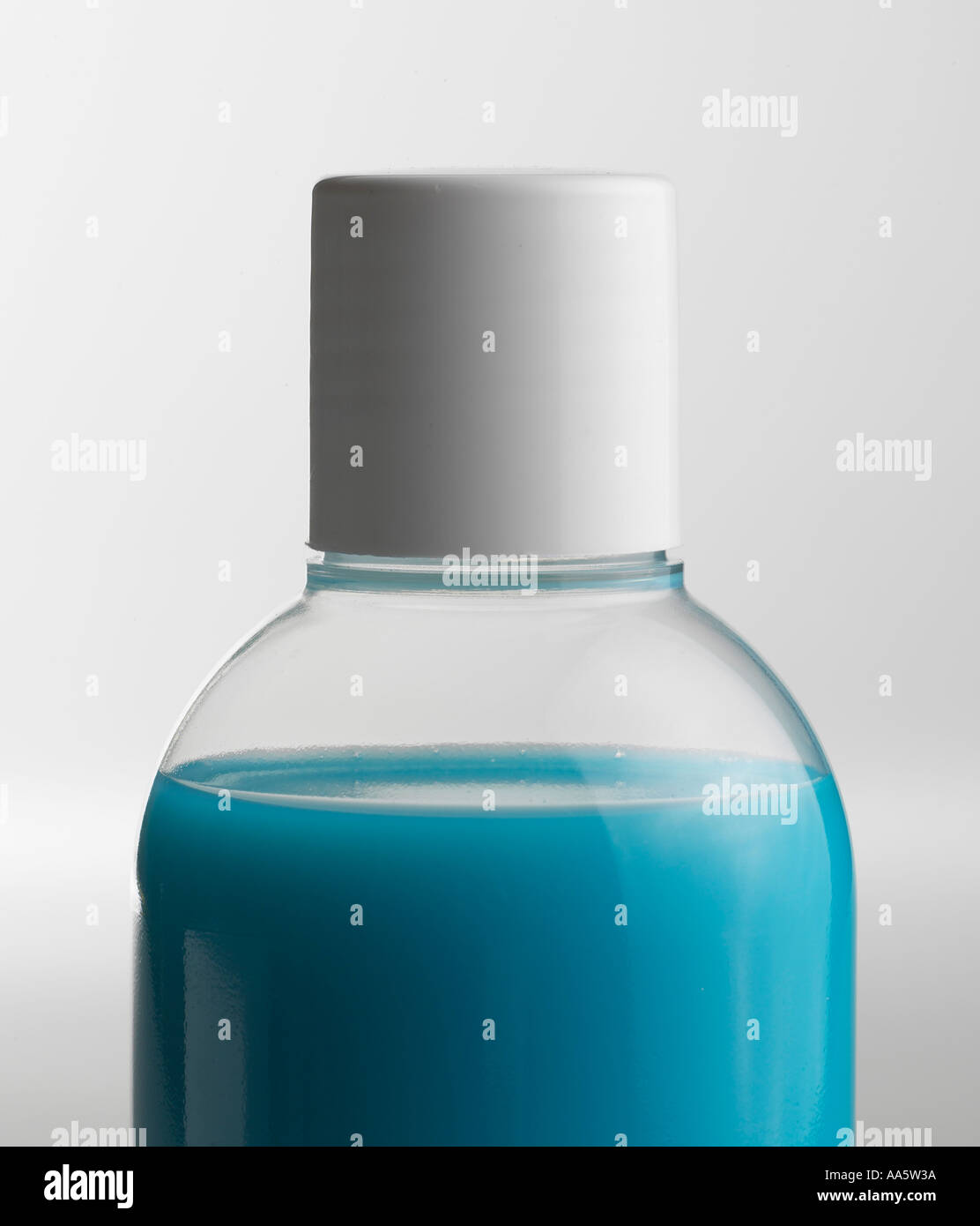 blue liquid in a plastic bottle toilette bath bathroom restroom clean ...