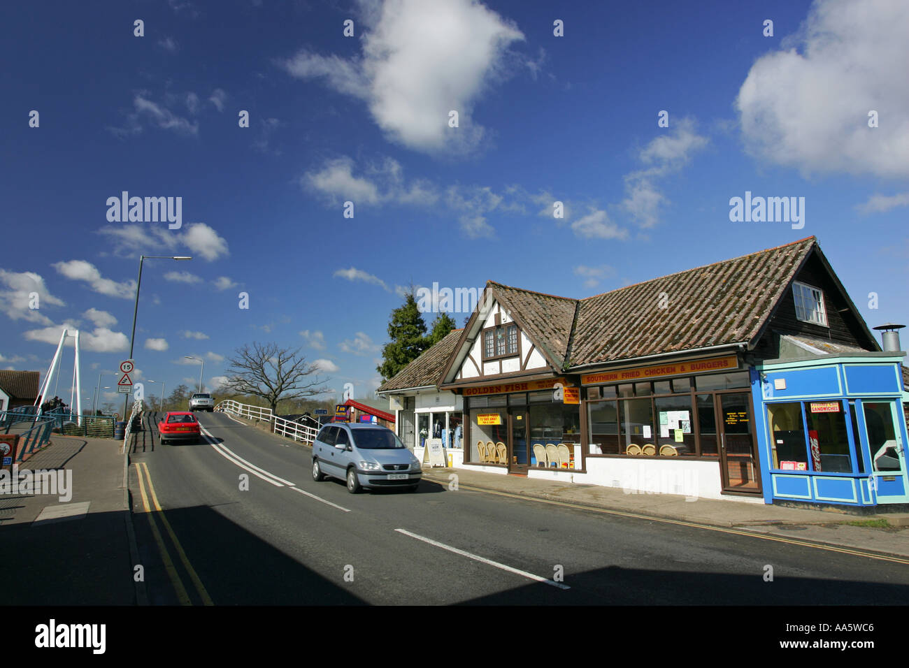 Center of Wroxham village on the Norfolk Broads with cars on the ...