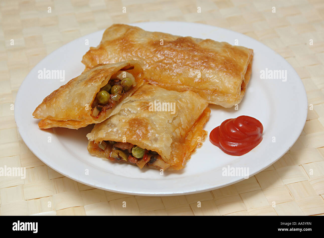 Stuffed Baked Patties in white plate Stock Photo - Alamy