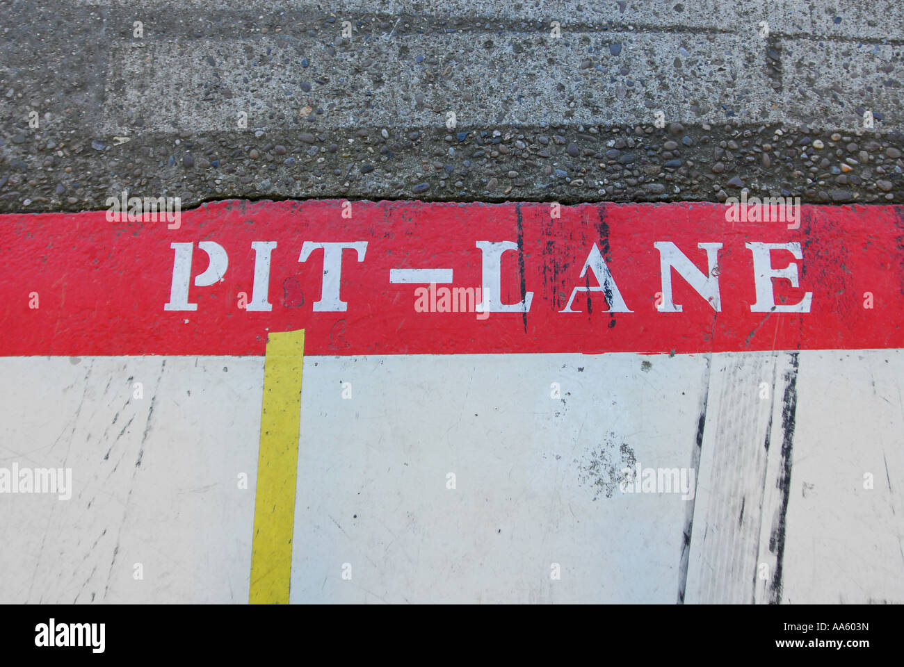 Pit Lane. marking on the ground at Silverstone, with trye marks across ...