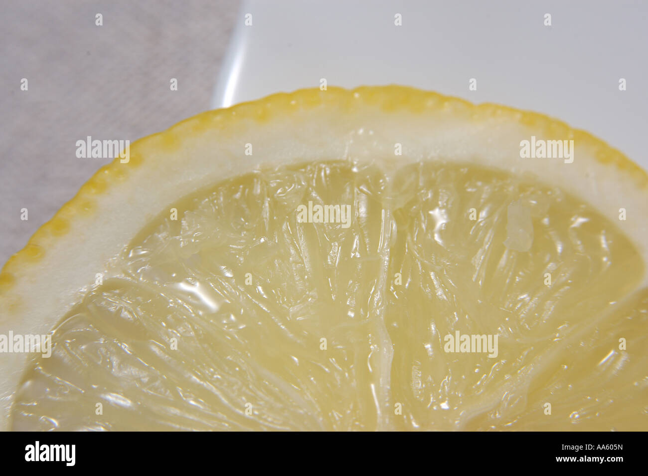 ANG103827 Fruit One lemon and slice on the plate Stock Photo - Alamy