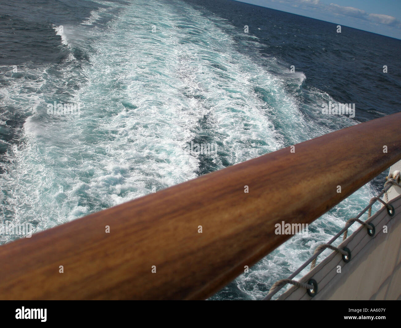 large wake from the vast and powerful Queen Mary 2 cuts across the ...