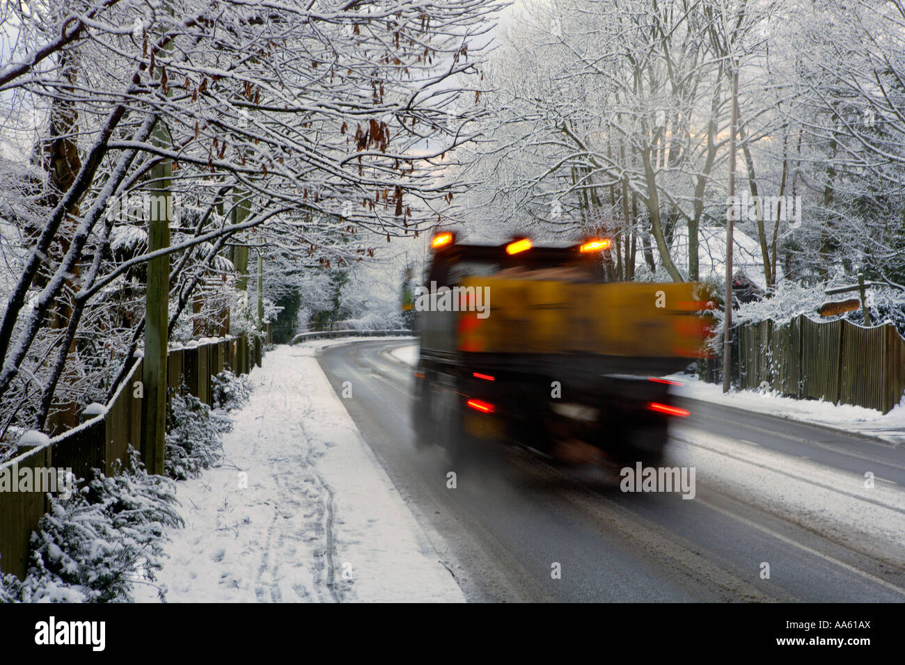 Gritting truck, lorry on snow covered road Kent, England Stock Photo ...