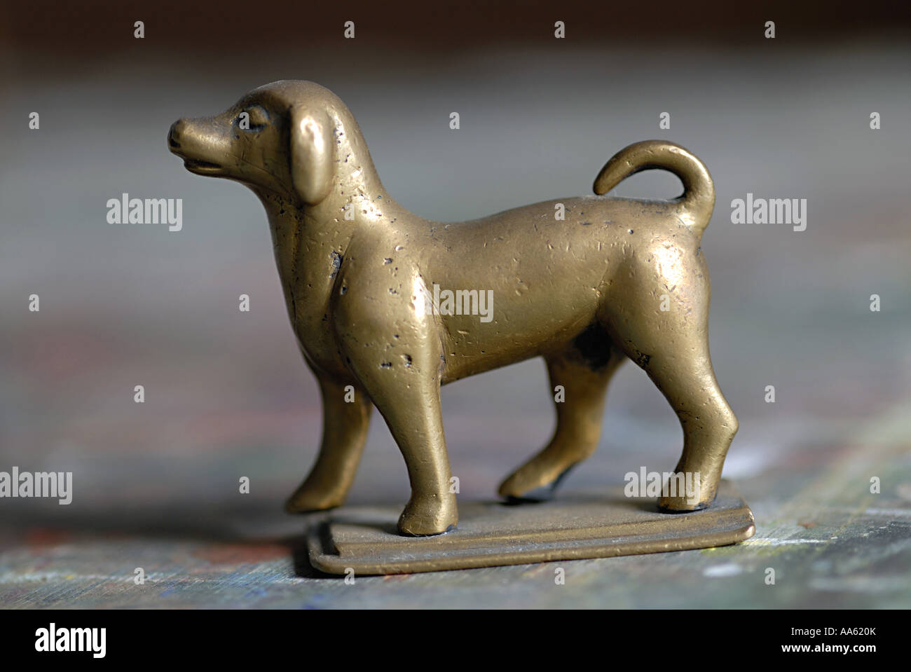 STP104342 Toy display dog in brass metal sculpture Stock Photo - Alamy