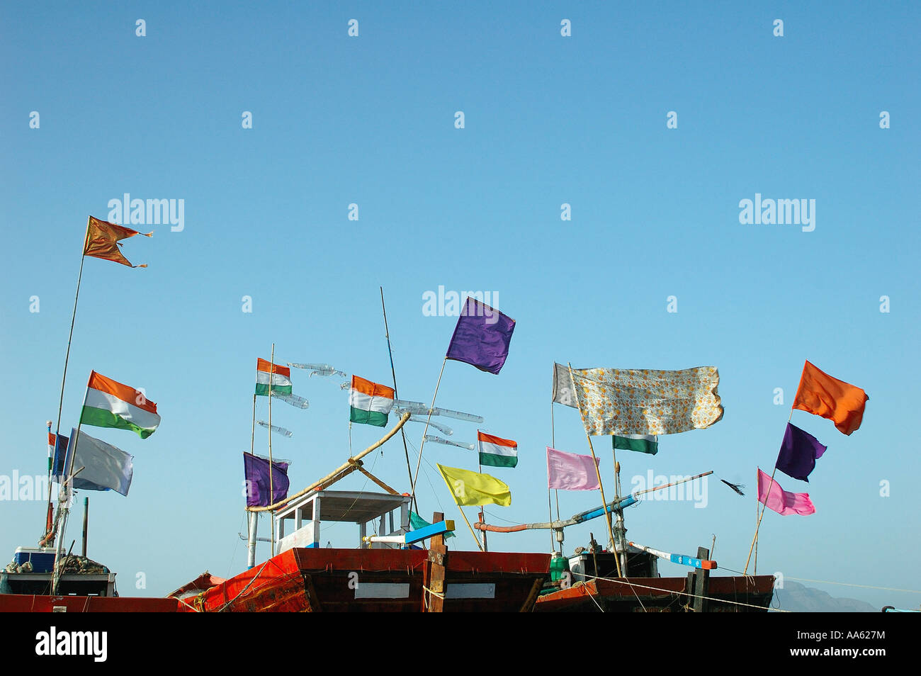 VEP104417 Indian flag and other colorful flags on ship and trawlers in ...