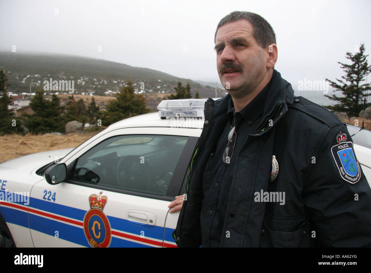 Royal Newfoundland Constabulary constable and car at Cape Spear Stock ...