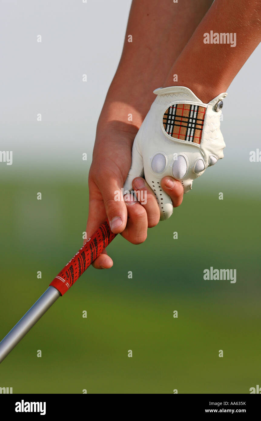 Golfers Grip in Gloved Hand Stock Photo - Alamy