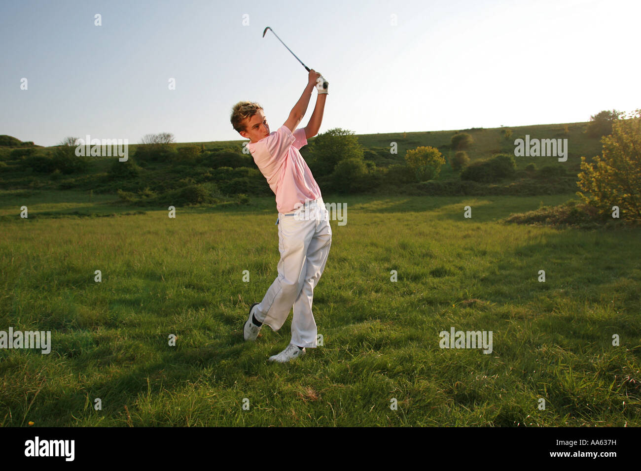 Teenager playing Golf Stock Photo - Alamy