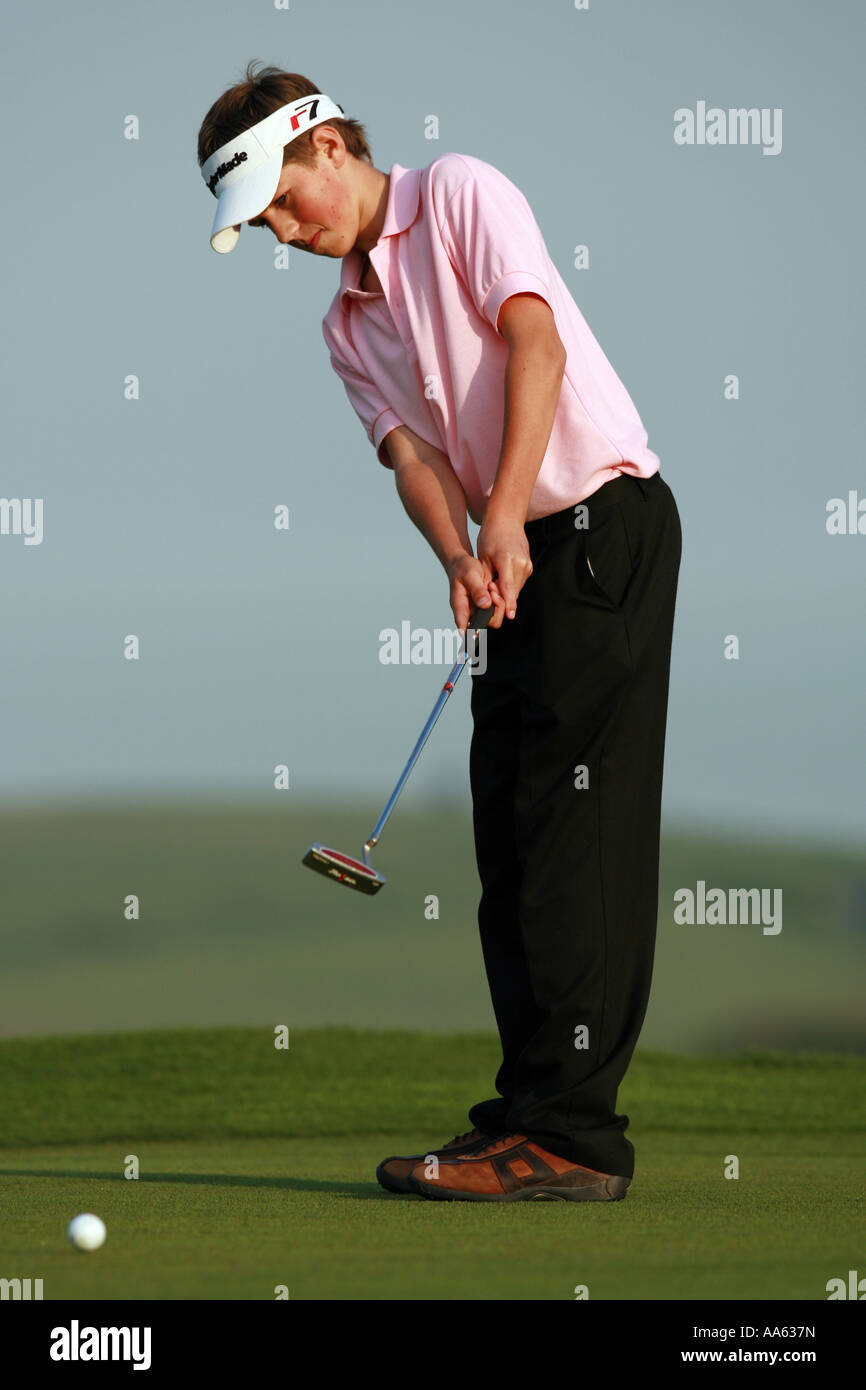 Teenager playing Golf Stock Photo - Alamy
