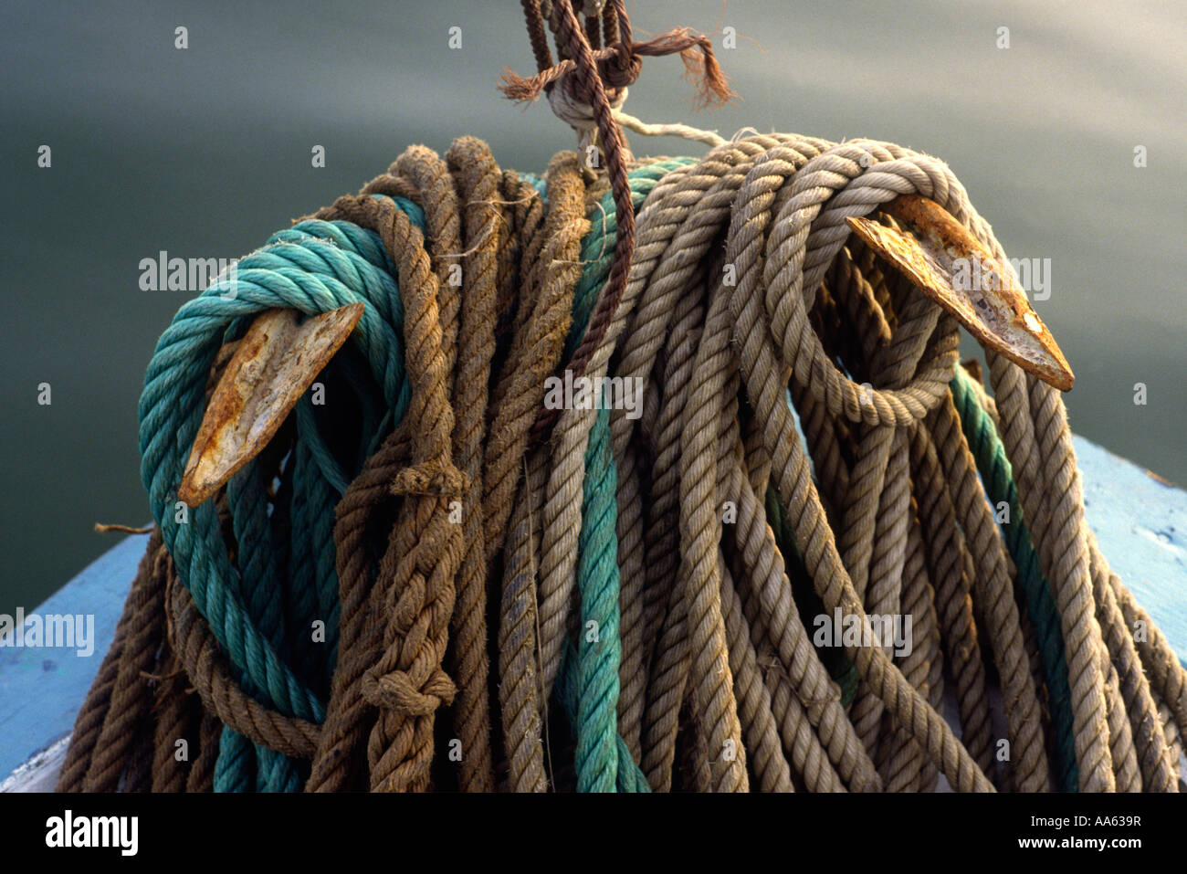 Ropes over an old anchor Stock Photo - Alamy