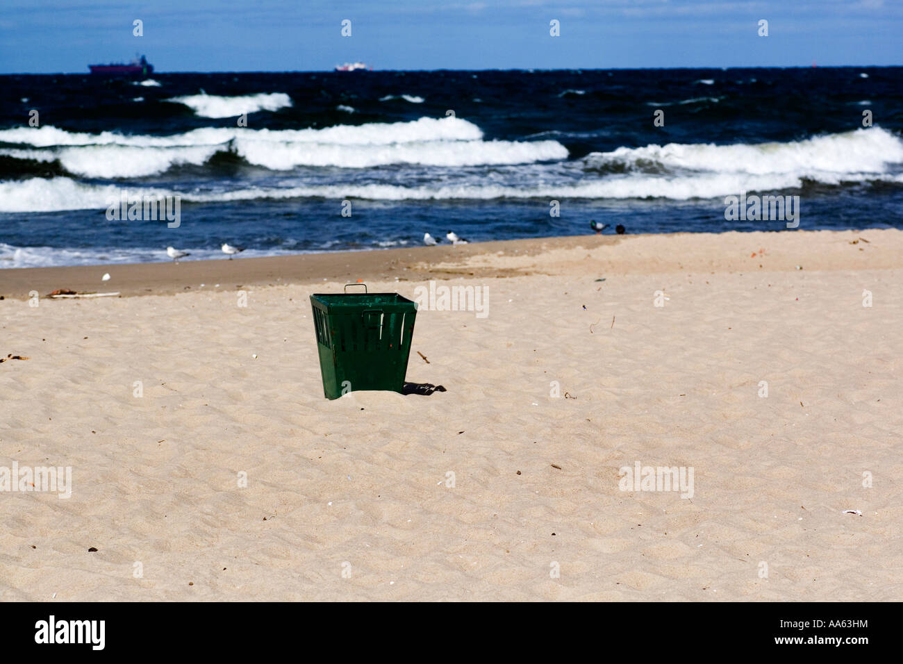 A close up of the refuse bin. Staying on the beach waste container ...