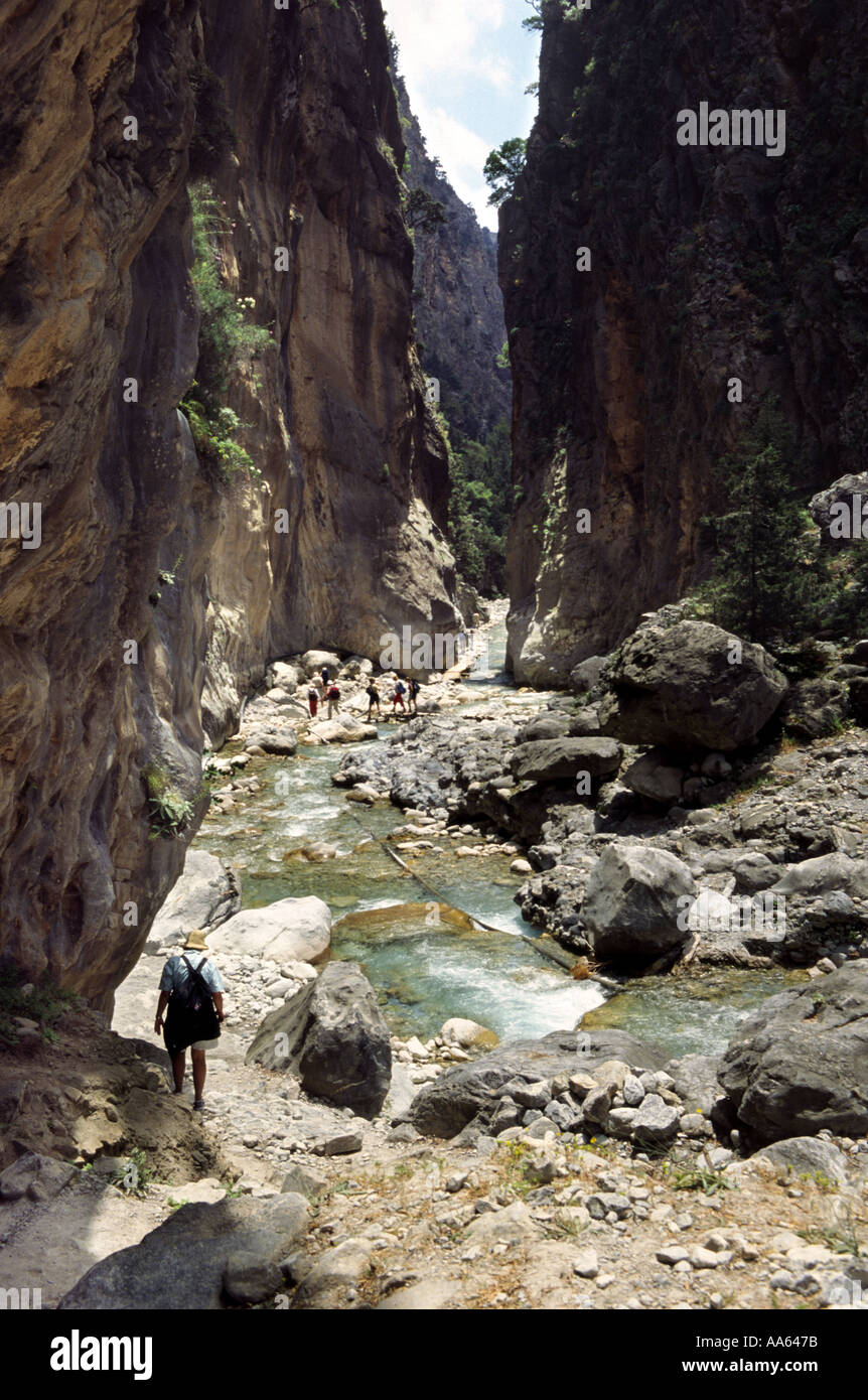 Trekking towards the exit of Samaria Gorge alongside a stream Stock ...
