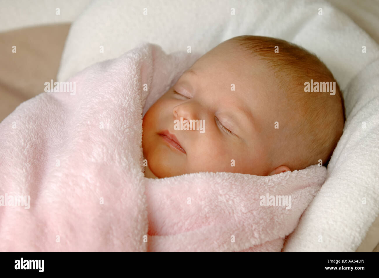 A newborn baby girl sleeping soundly Stock Photo - Alamy