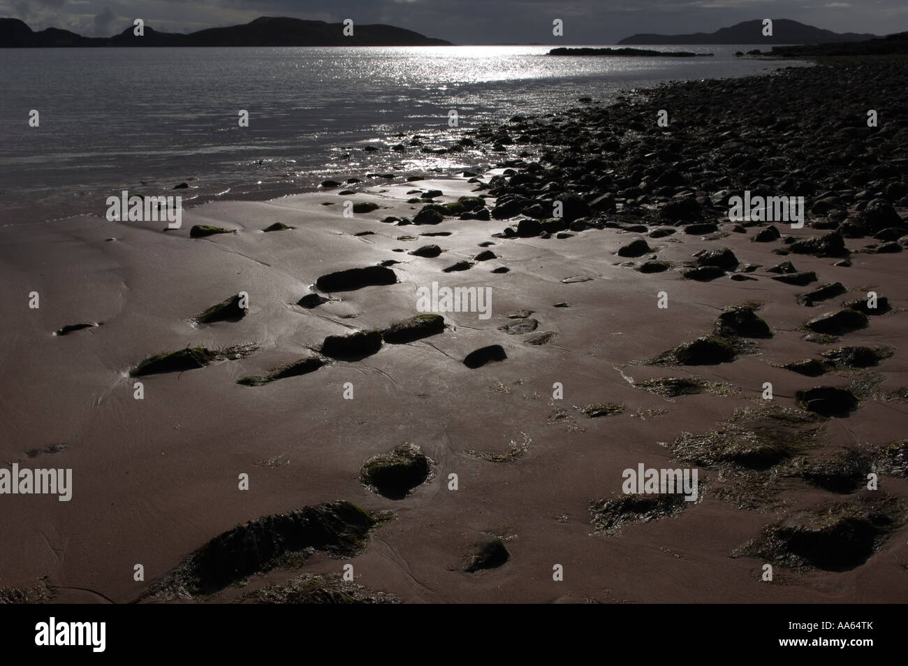 Rocks on a sandy beach, Achiltibuie, Scotland Stock Photo - Alamy
