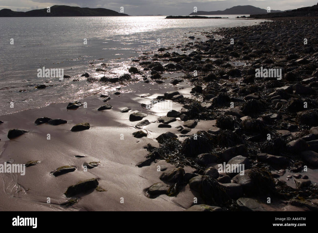 Rocks on a sandy beach, Achiltibuie, Scotland Stock Photo - Alamy