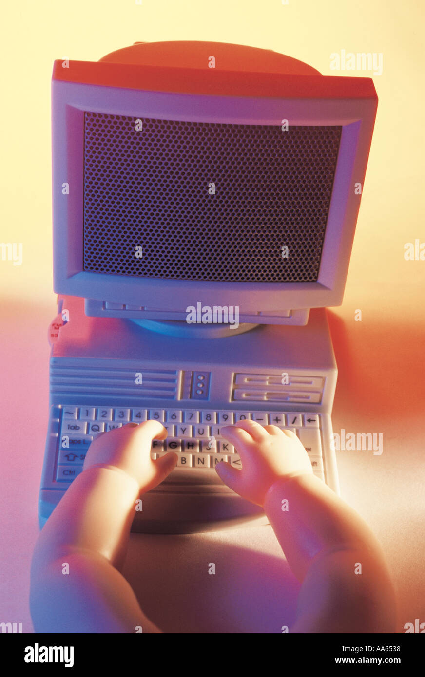 Doll with Toy Computer Stock Photo - Alamy