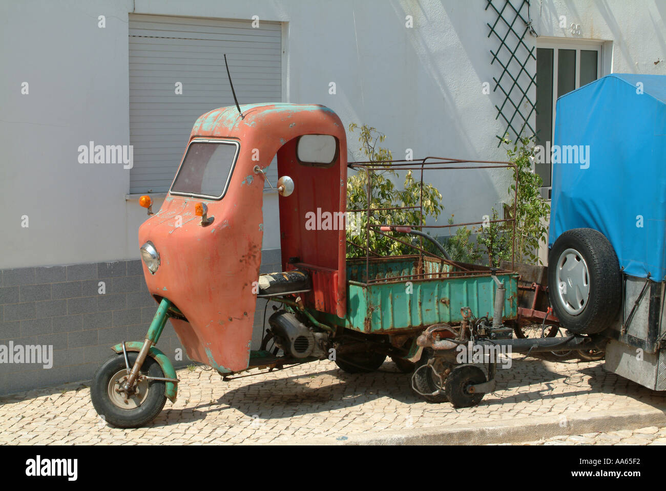 Old three wheel truck hi-res stock photography and images - Alamy