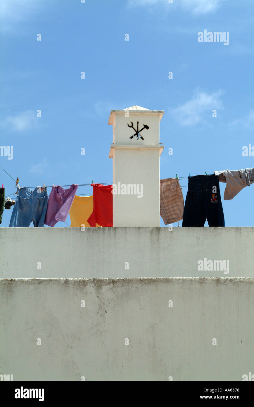 Chimney and Washing Line on House Roof in Town of Alvor Algarve ...