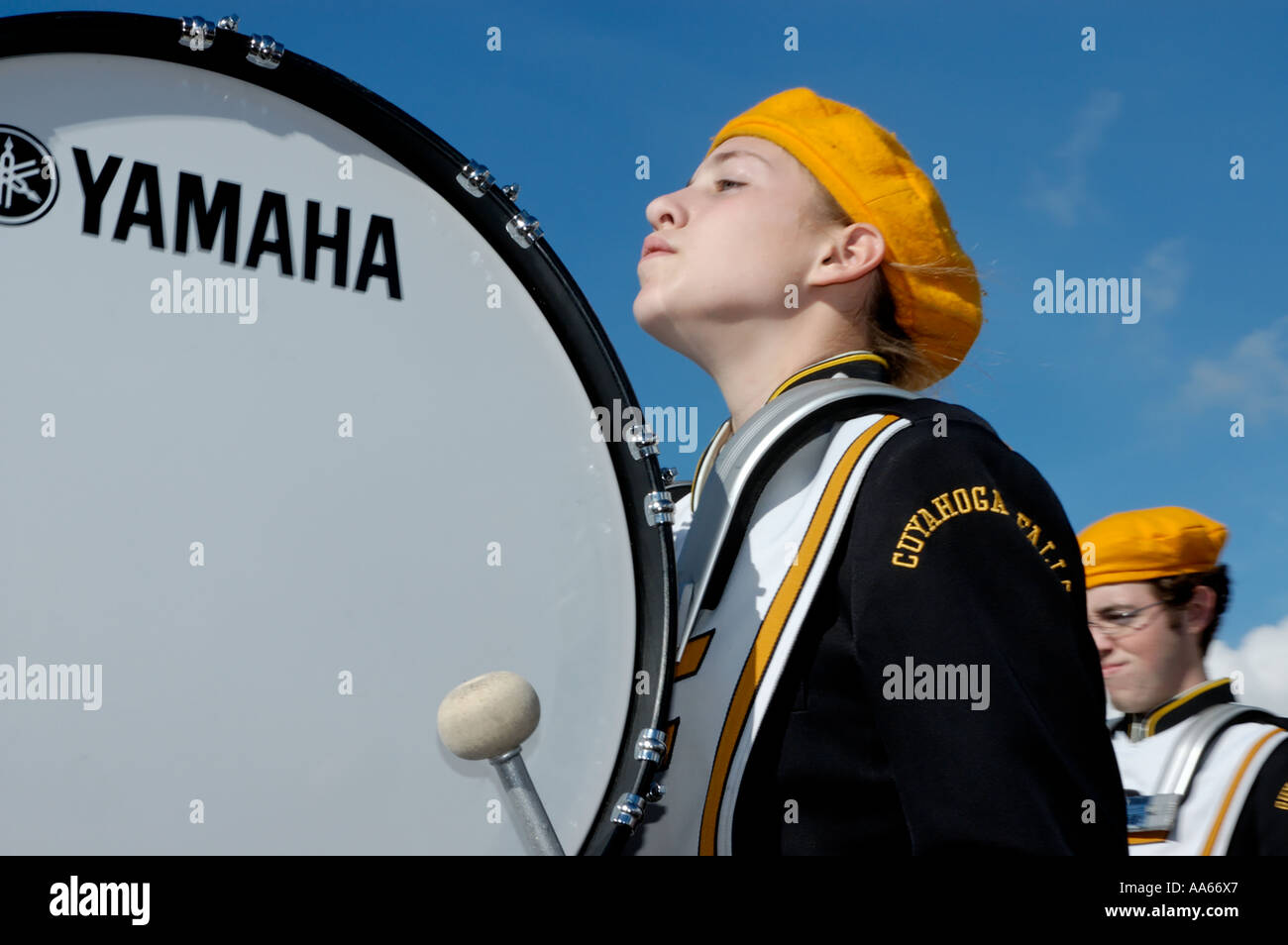 Female bass drummer marching in parade Stock Photo - Alamy
