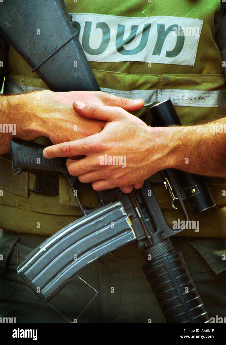 An Israeli soldier guards the entrance to the Wailing Wall in Jerusalem ...