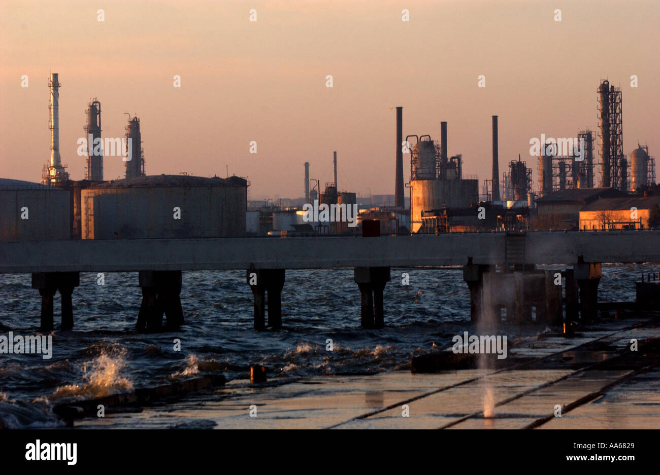 The Soviet era architecture of oil excavation sits on he shoreline of ...