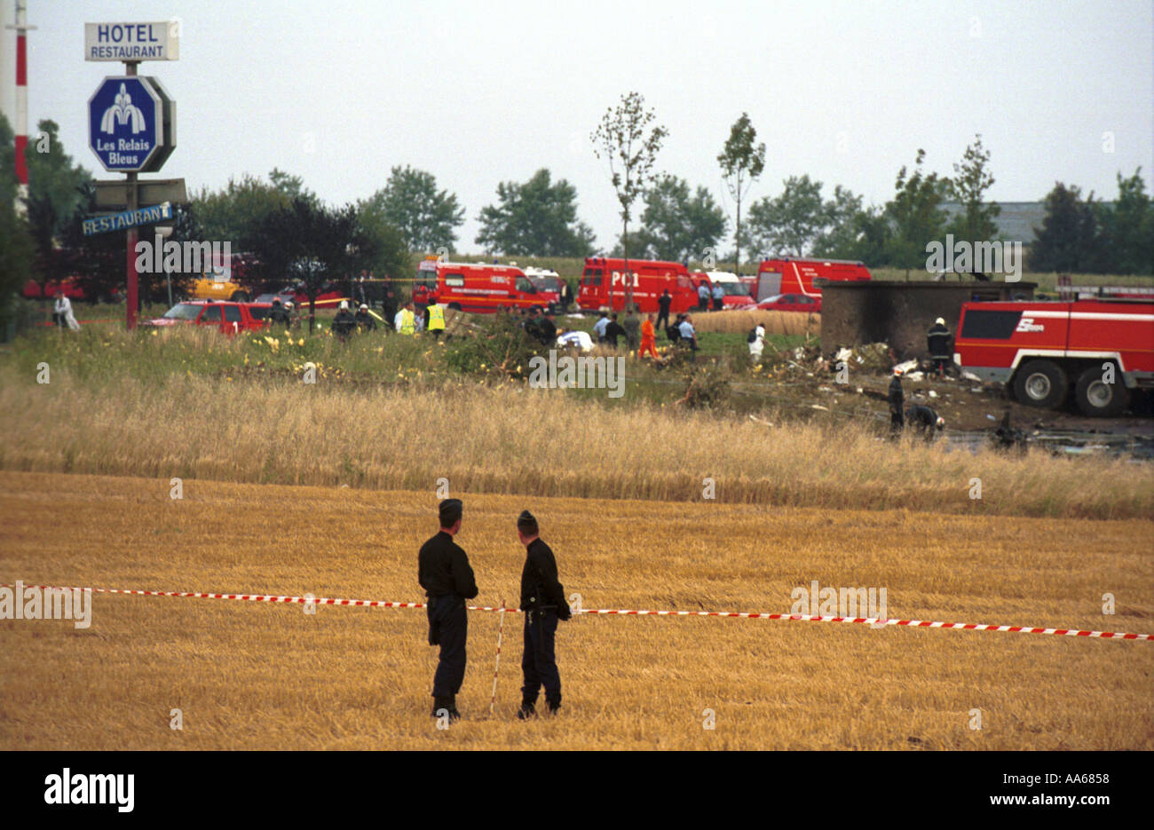 Firefighters put out the last flames of the Air France Concorde that ...