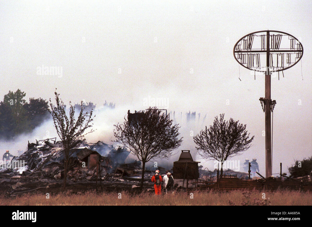 Firefighters put out the last flames of the Air France Concorde that ...