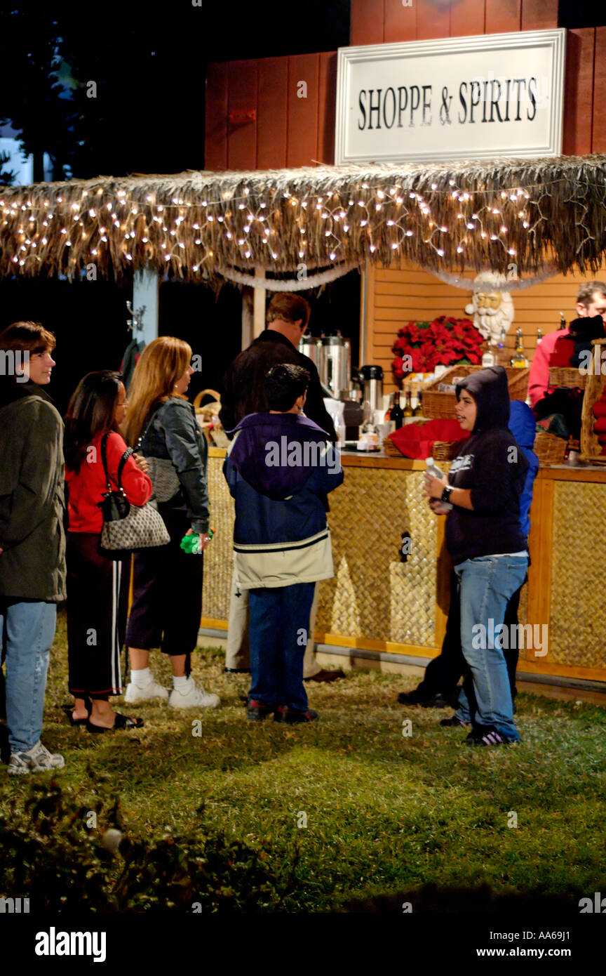 People lined up at refreshment stand at the Hotel Del Coronado at night ...