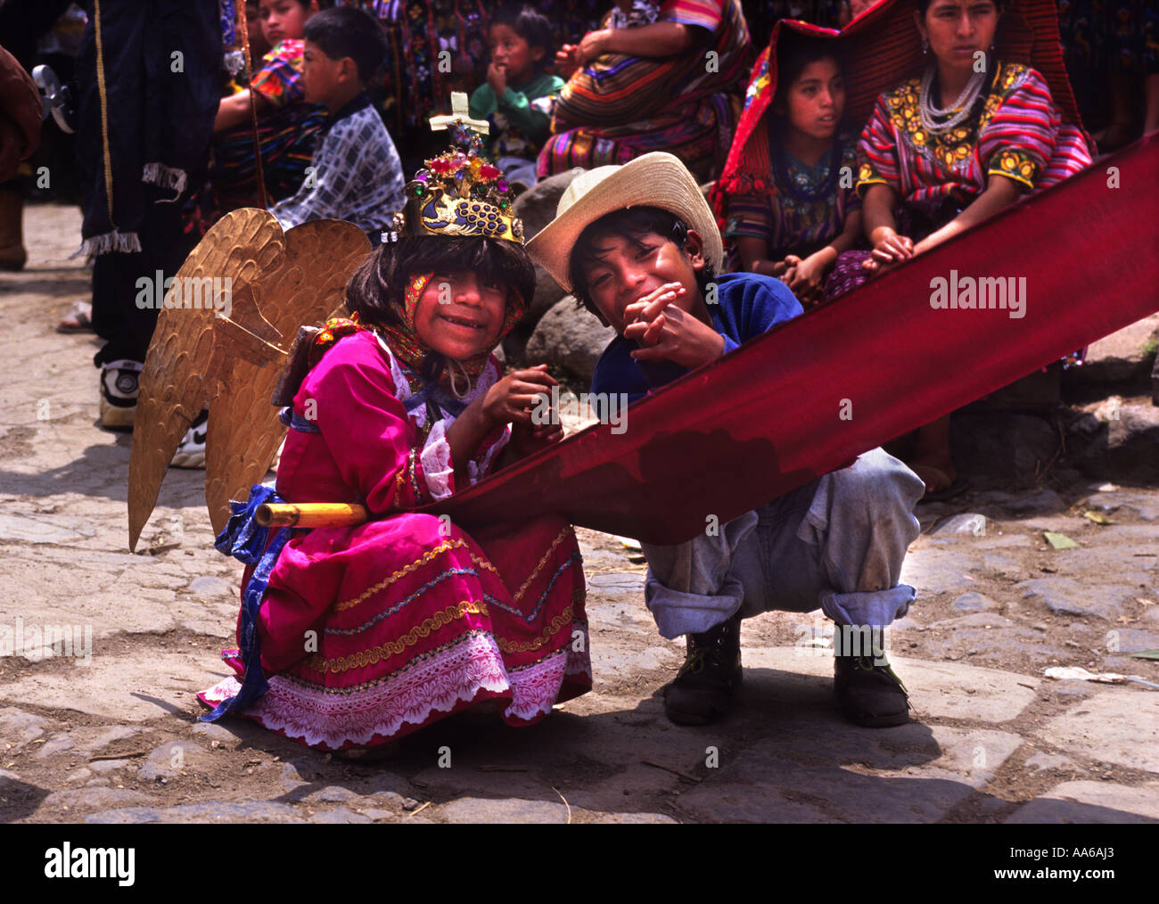 A YOUNG QUICHE MAYAN GIRL DRESSED AS AN ANGEL AT SEMANA SANTA ...