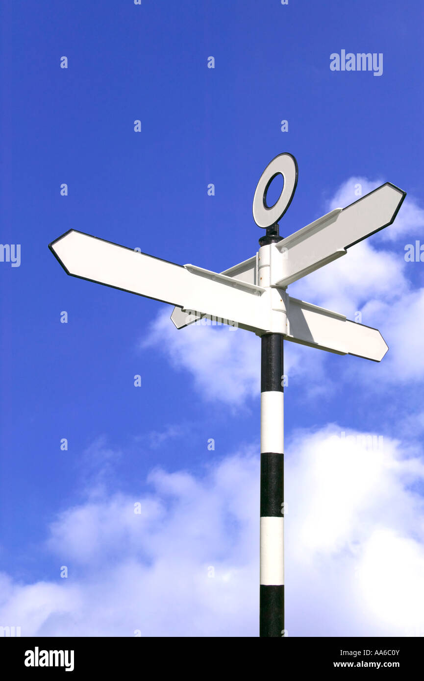 Blank road sign against a bright blue sky, space for your own text on ...