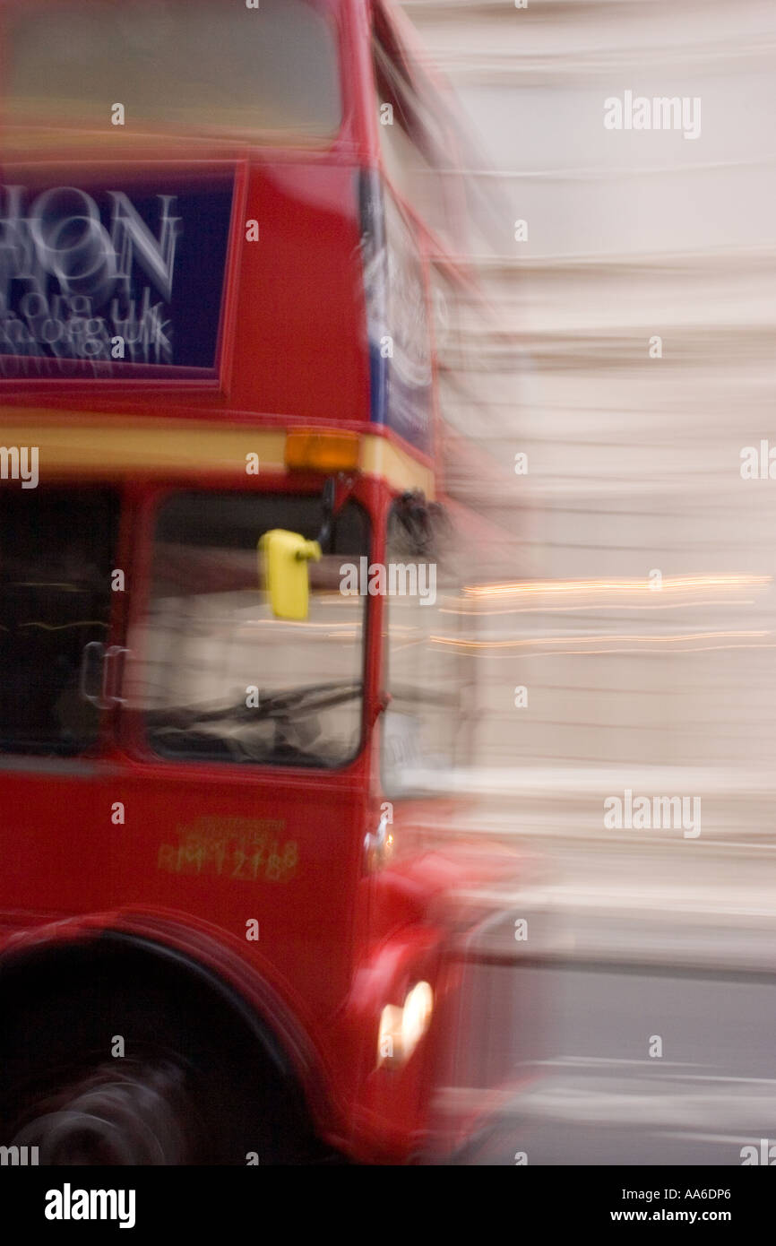 Double decker London Bus racing through the city Stock Photo - Alamy