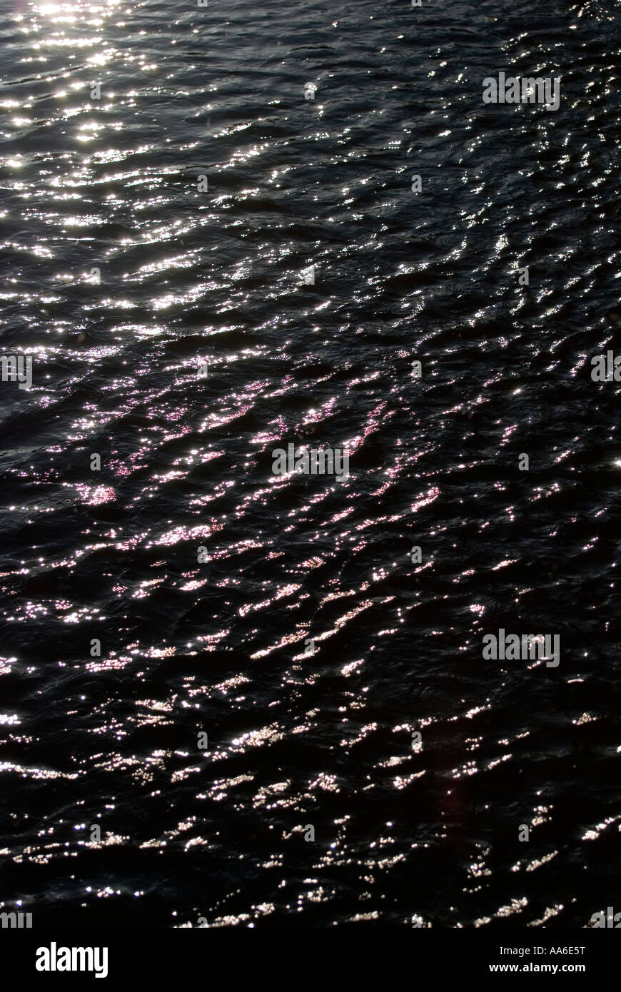 Sunlight reflecting of water Stock Photo - Alamy