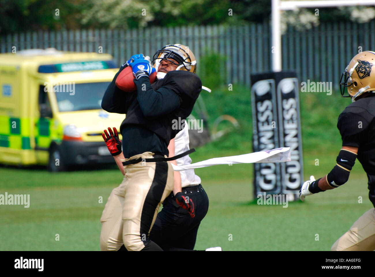 American Foorball catch Stock Photo - Alamy