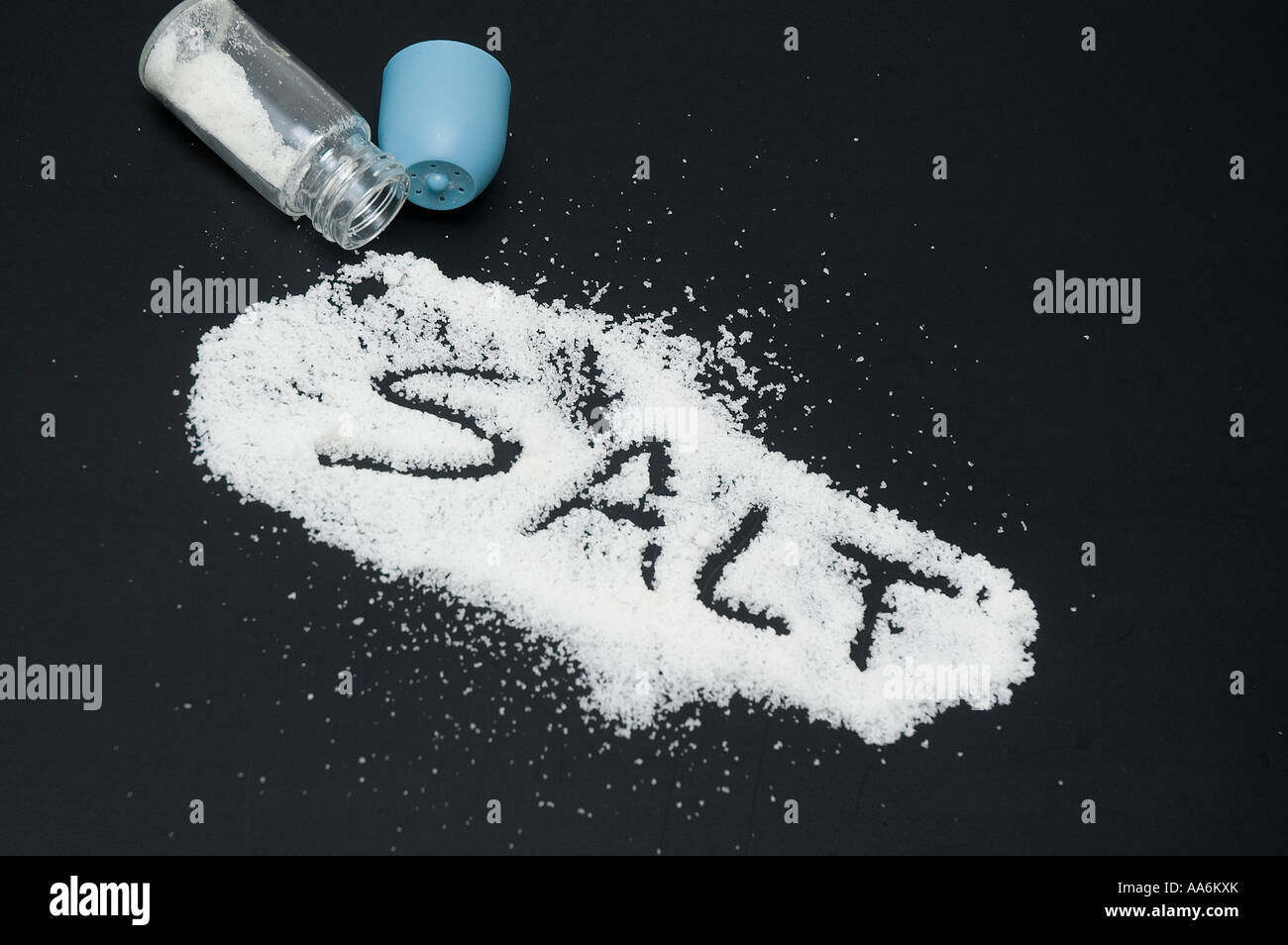 salt on the table Stock Photo - Alamy