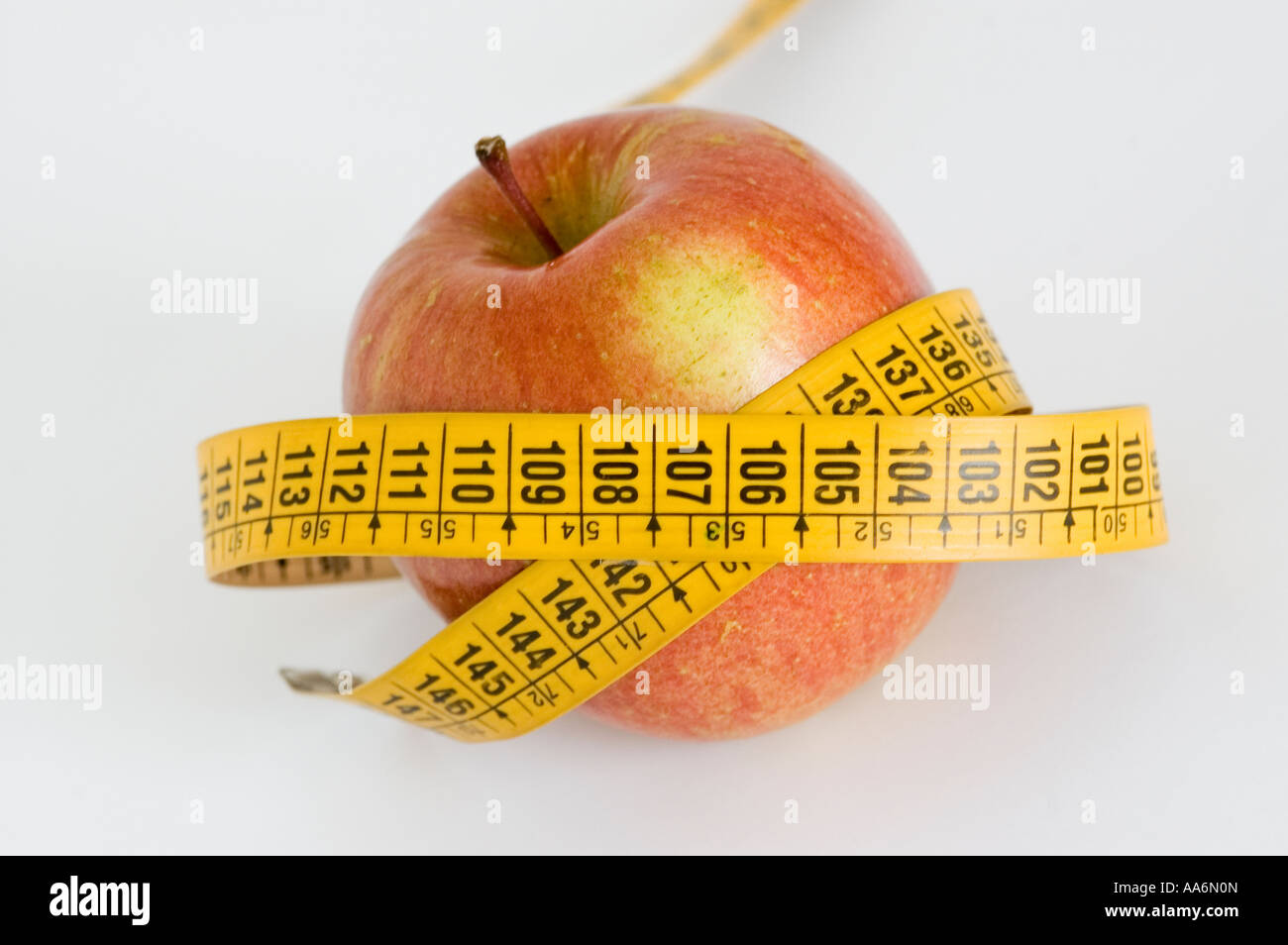 an apple with a meter Stock Photo - Alamy