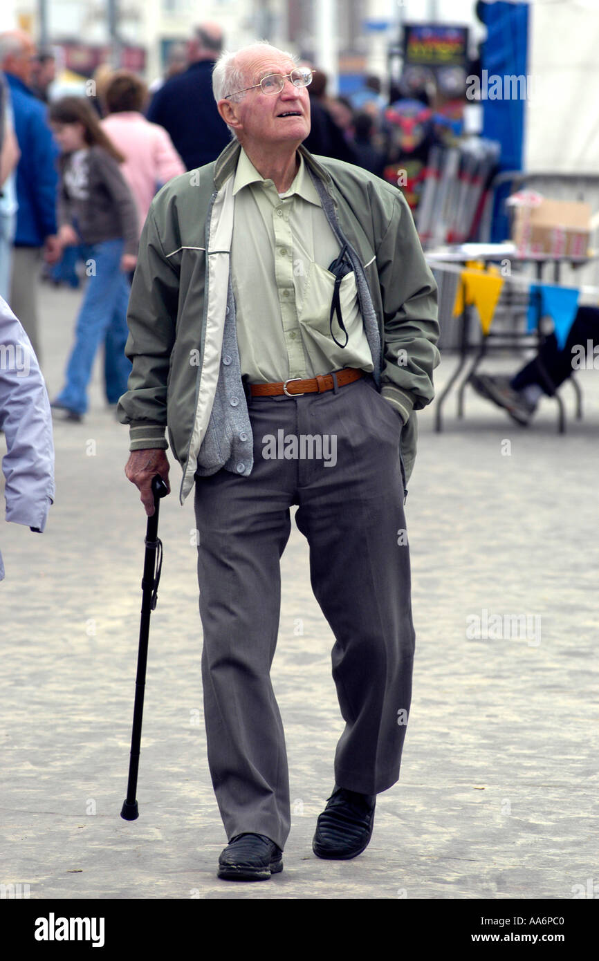 Elderly man using walking aid hi-res stock photography and images - Alamy