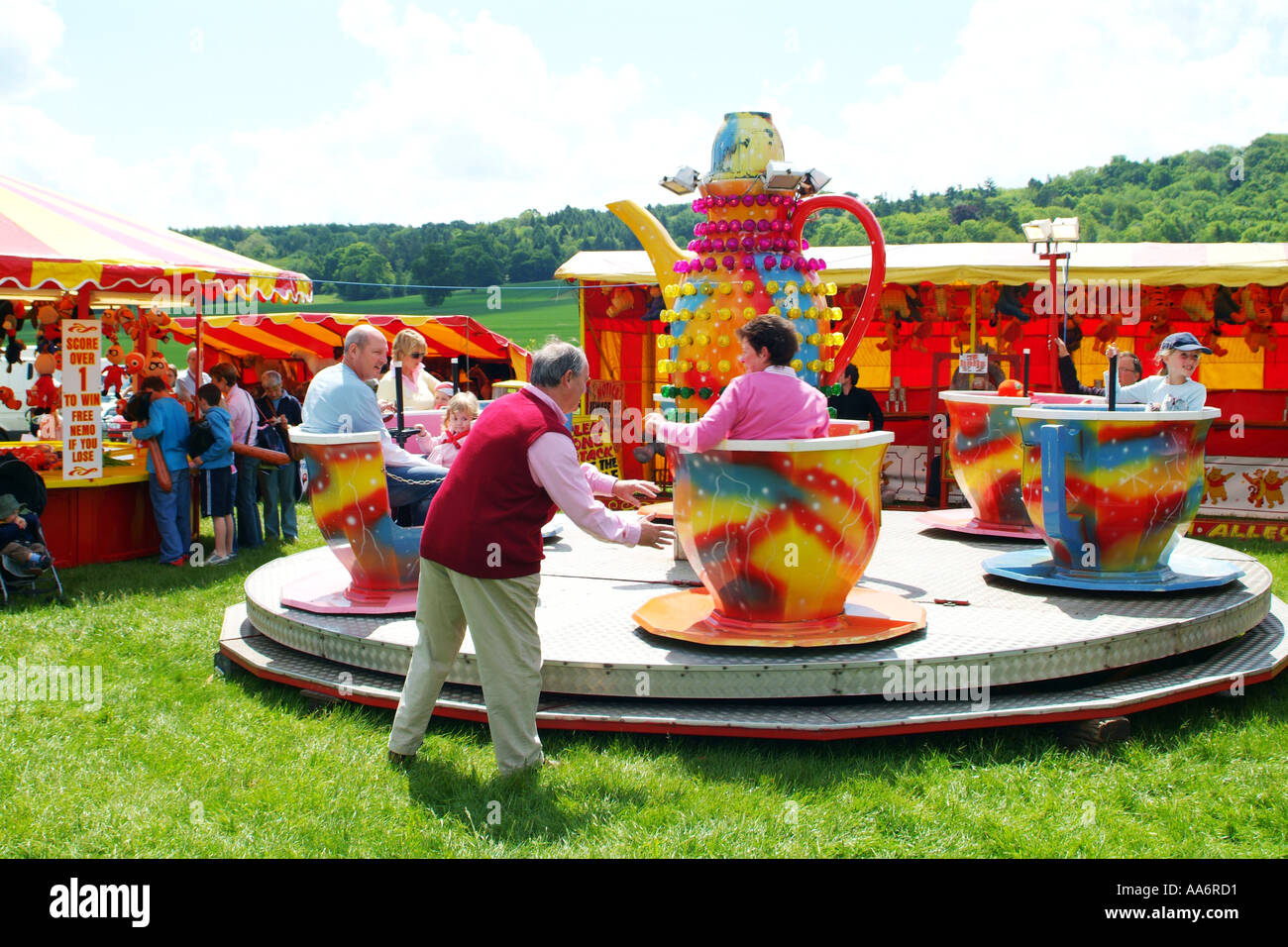 Brightly coloured funfair rides hi-res stock photography and images - Alamy