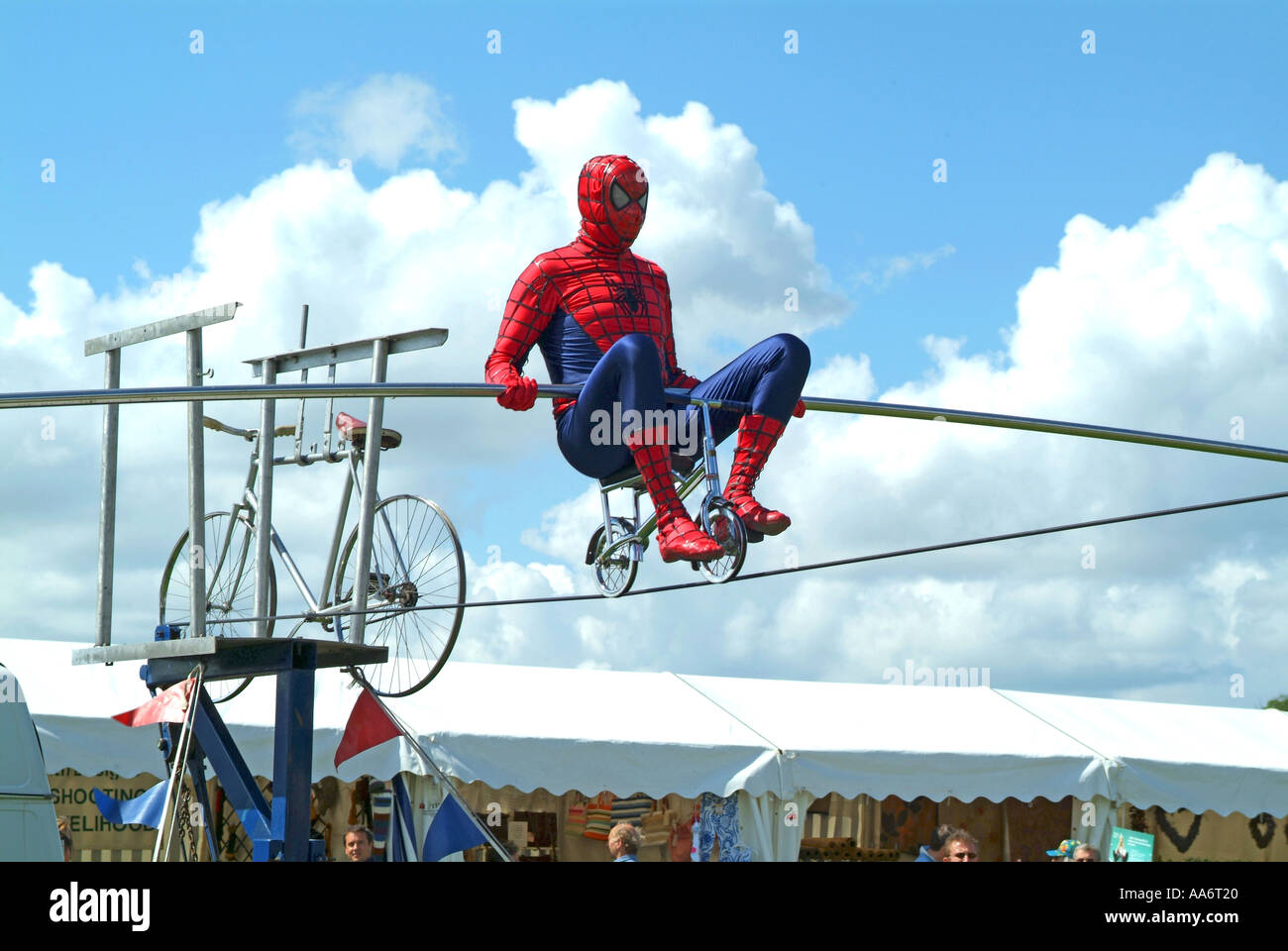 Adult male dressed in a Spiderman costume performing stunts Stock Photo ...