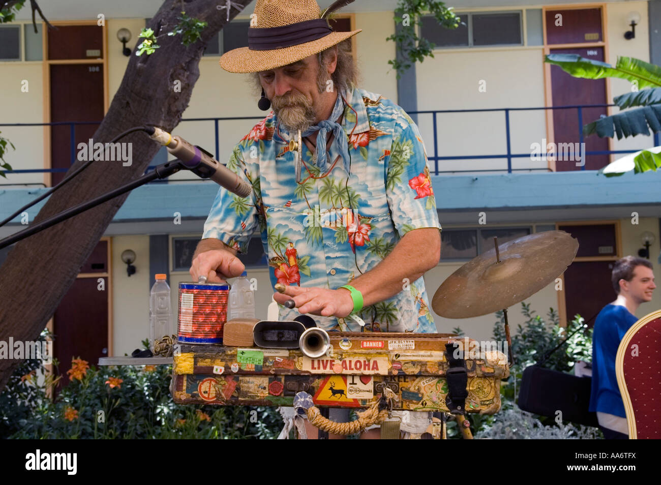 A music performance and demonstration by a musician who uses recycled ...