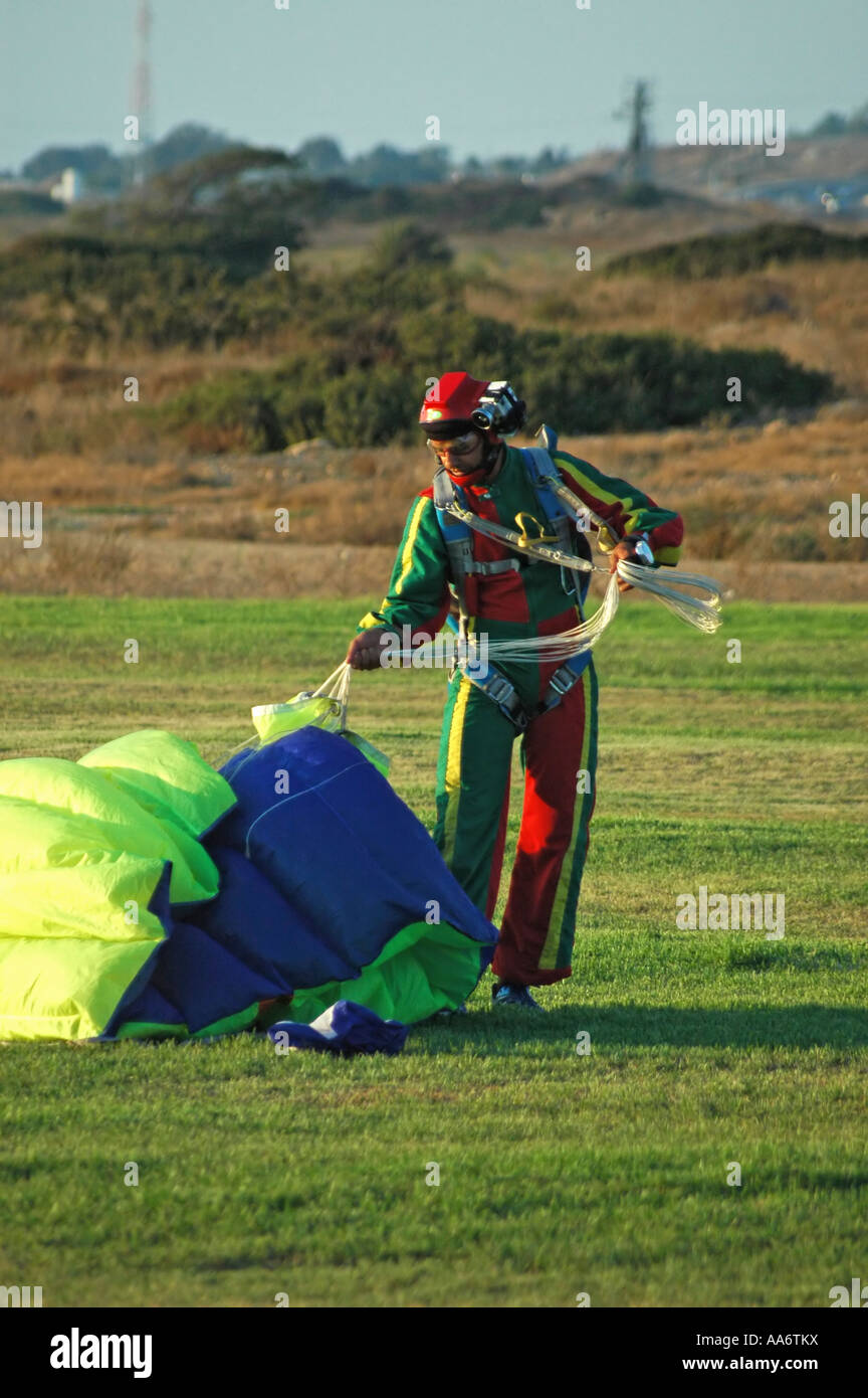 Man folding parachute hi-res stock photography and images - Alamy