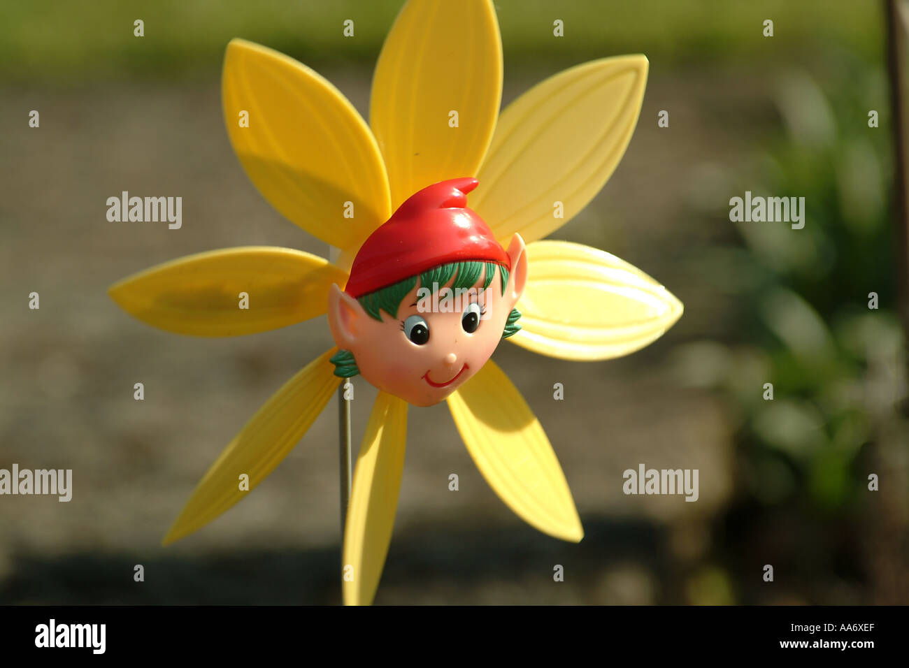 Elf face windmill garden ornament Stock Photo - Alamy