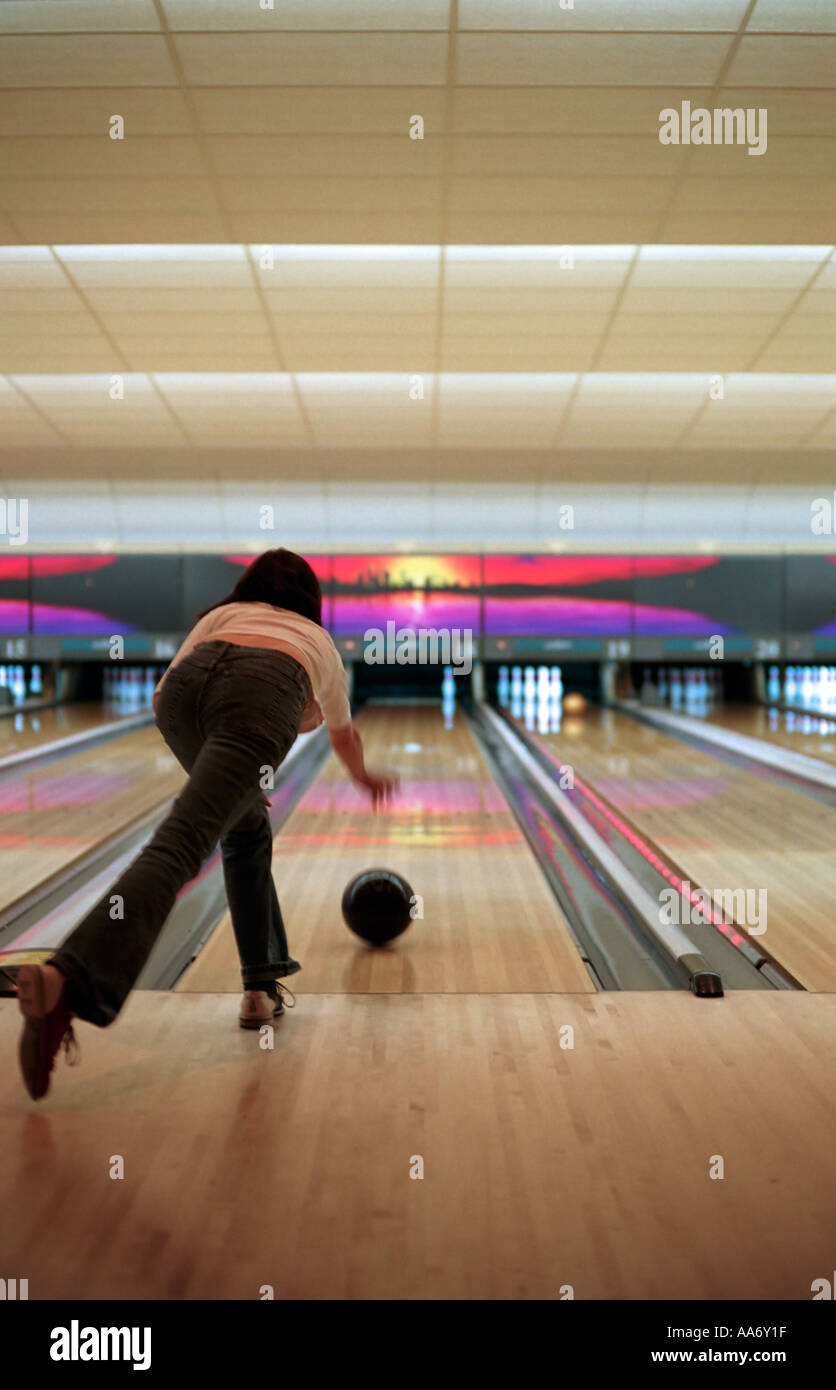 Female playing ten pin bowling Stock Photo - Alamy