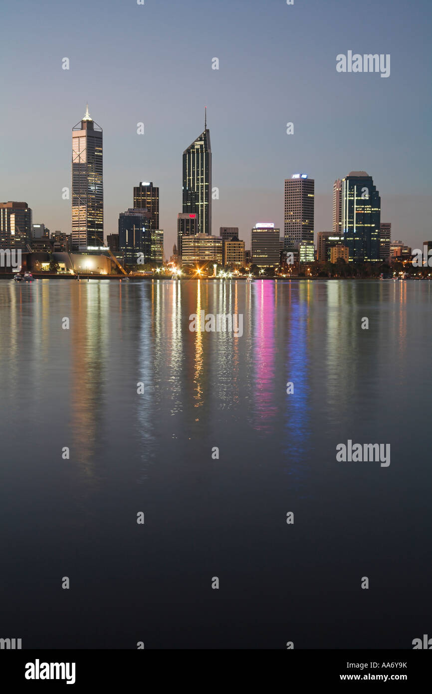 Perth city skyscrapers reflected at dusk in the Swan river of Western ...