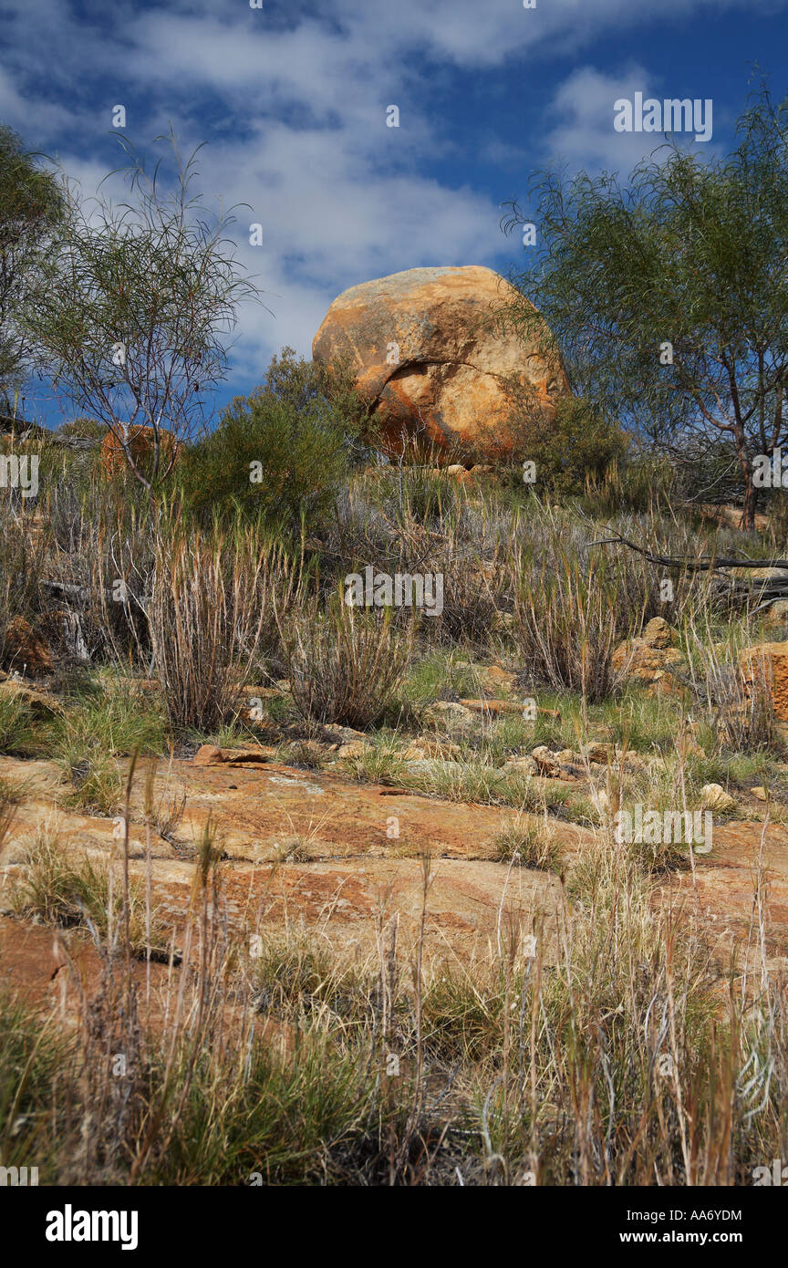 giant boulder sitting atop a granite rock outcrop in the Western ...